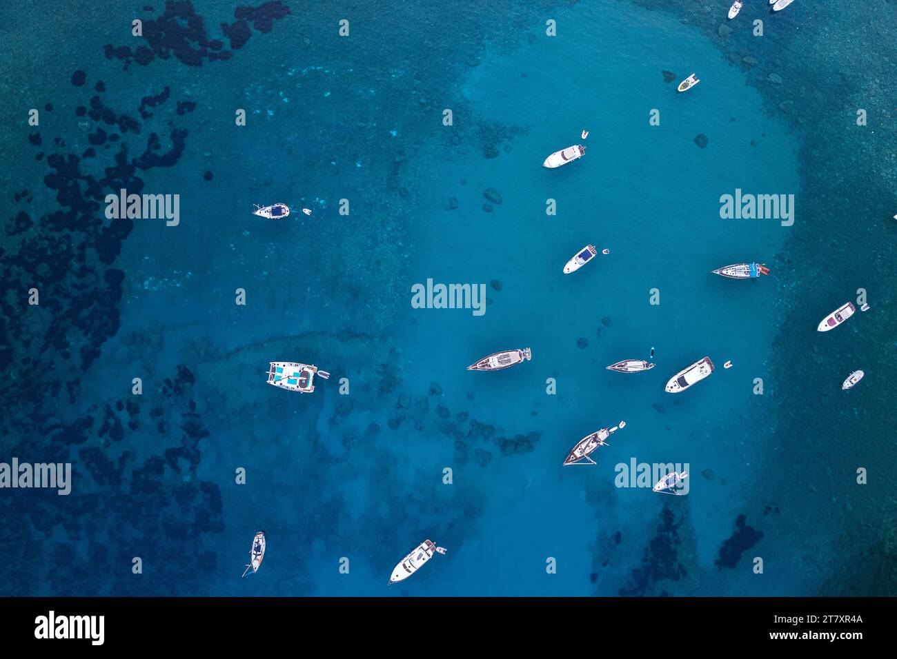 Aerial view of boats anchored in the crystal blue waters, Palmarola ...