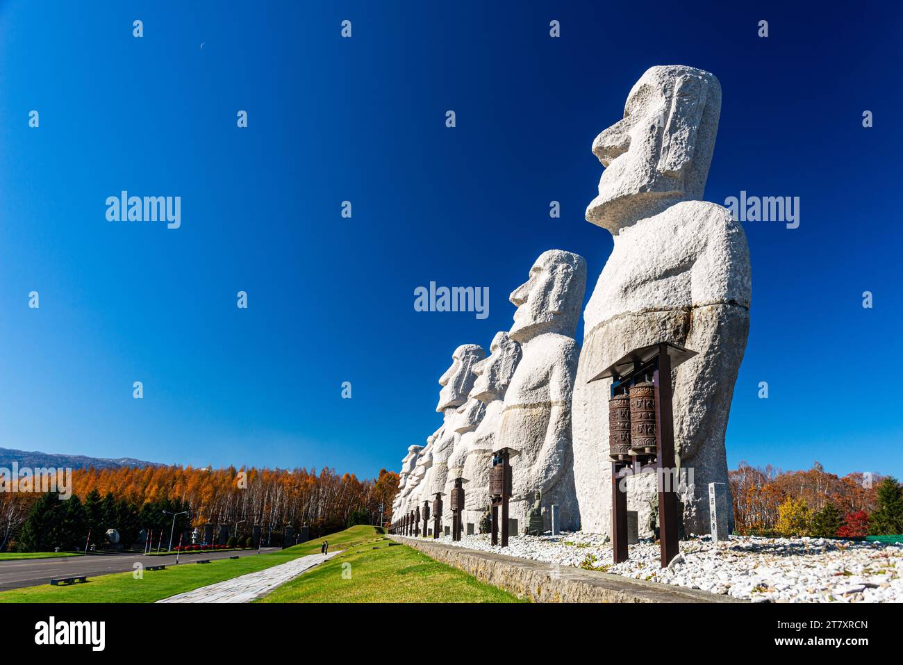 Moai statues against a blue sky, Makomanai Takino Cemetery, Hill of the ...