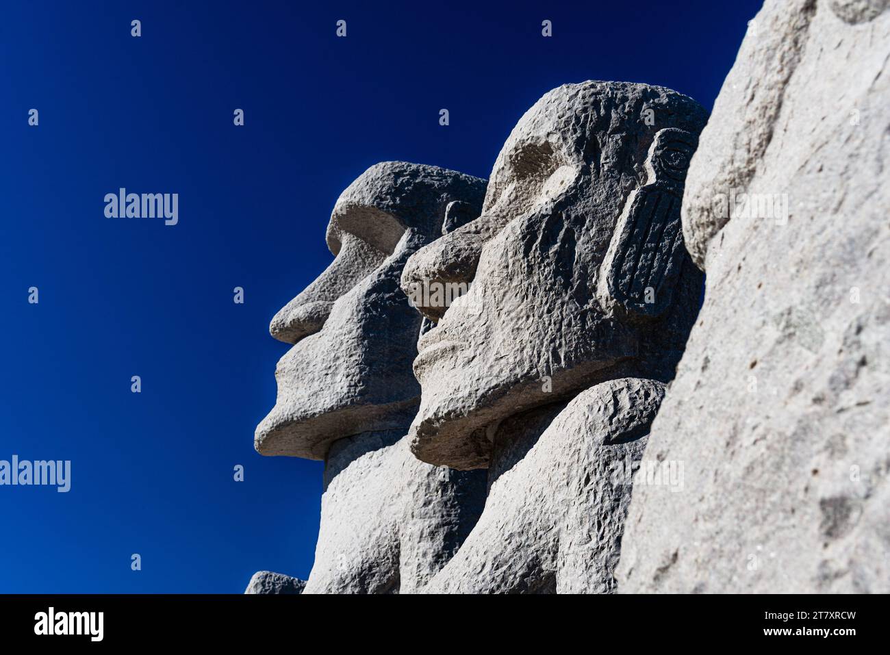 Moai statues against a blue sky, Makomanai Takino Cemetery, Hill of the ...