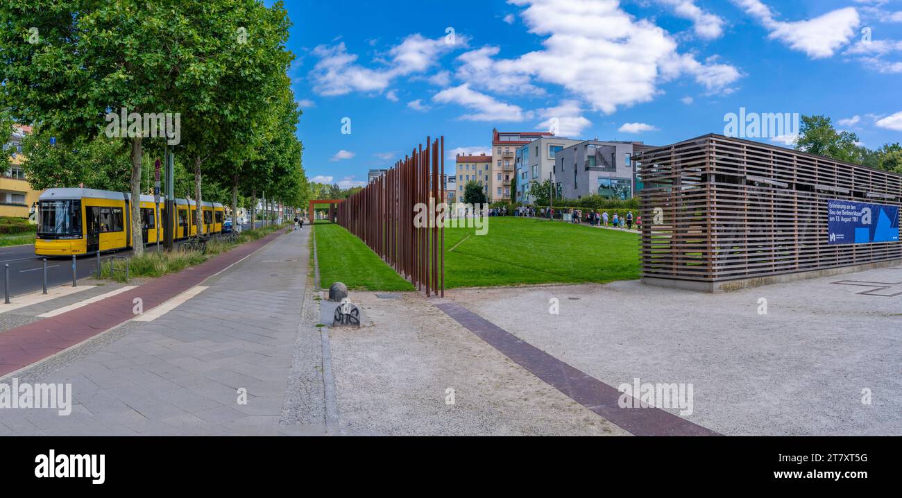 View of yellow city tram at the Berlin Wall Memorial, Memorial Park ...
