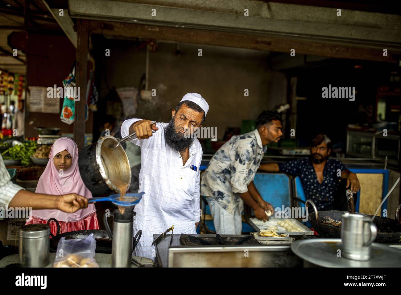 Child at tea stall hi-res stock photography and images - Alamy