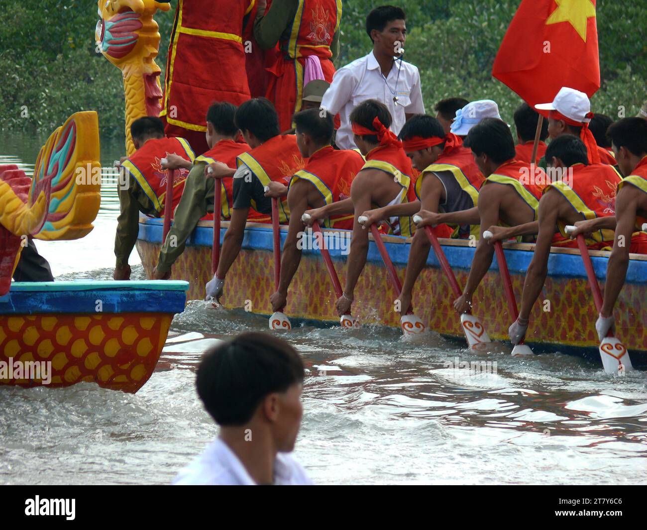 Dragon boat race in Quan Lan island. A dragon boat (also dragonboat) is ...
