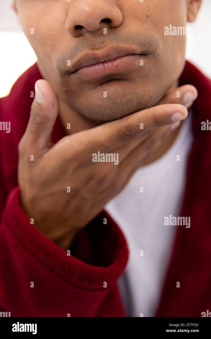 Biracial man touching face hi-res stock photography and images - Alamy