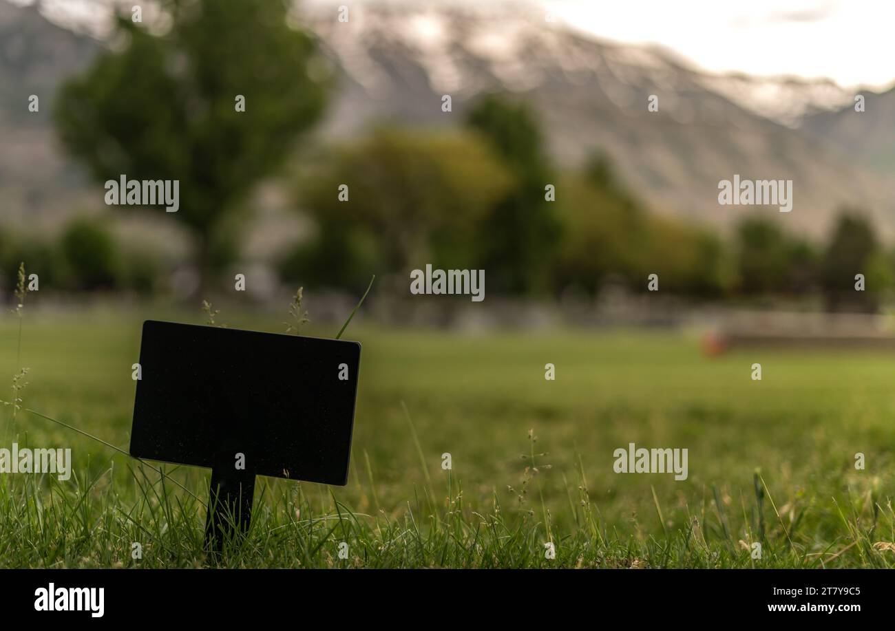 Black Blank Sign Outside Cemetery Stock Photo - Alamy