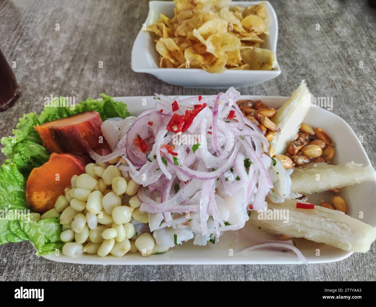 ceviche with corn, sweet potato and yucca. peruvian food Stock Photo ...
