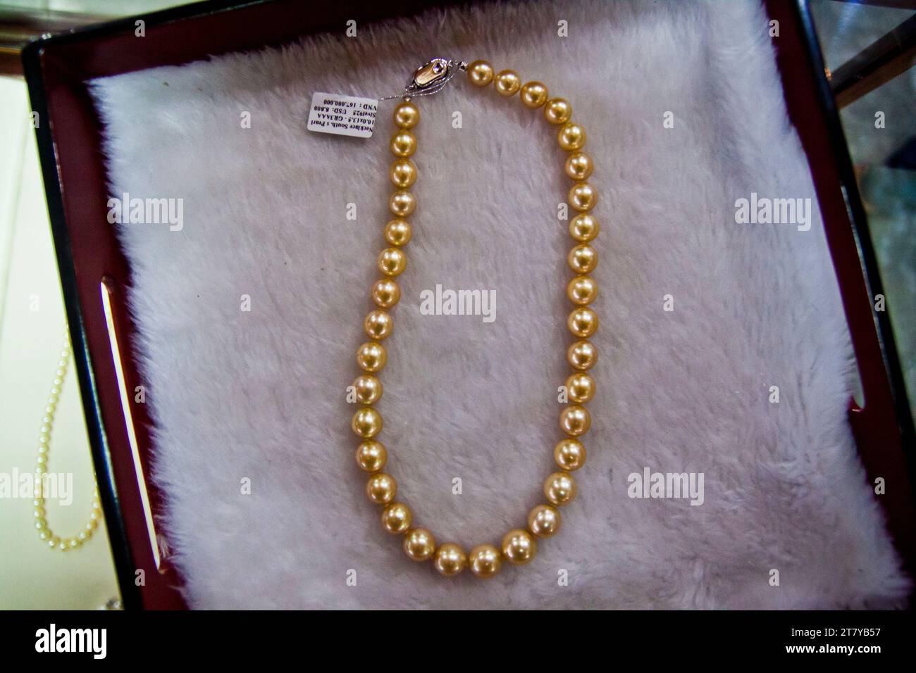 A pearl necklace on display in a showroom at a pearl farm in Halong Bay ...