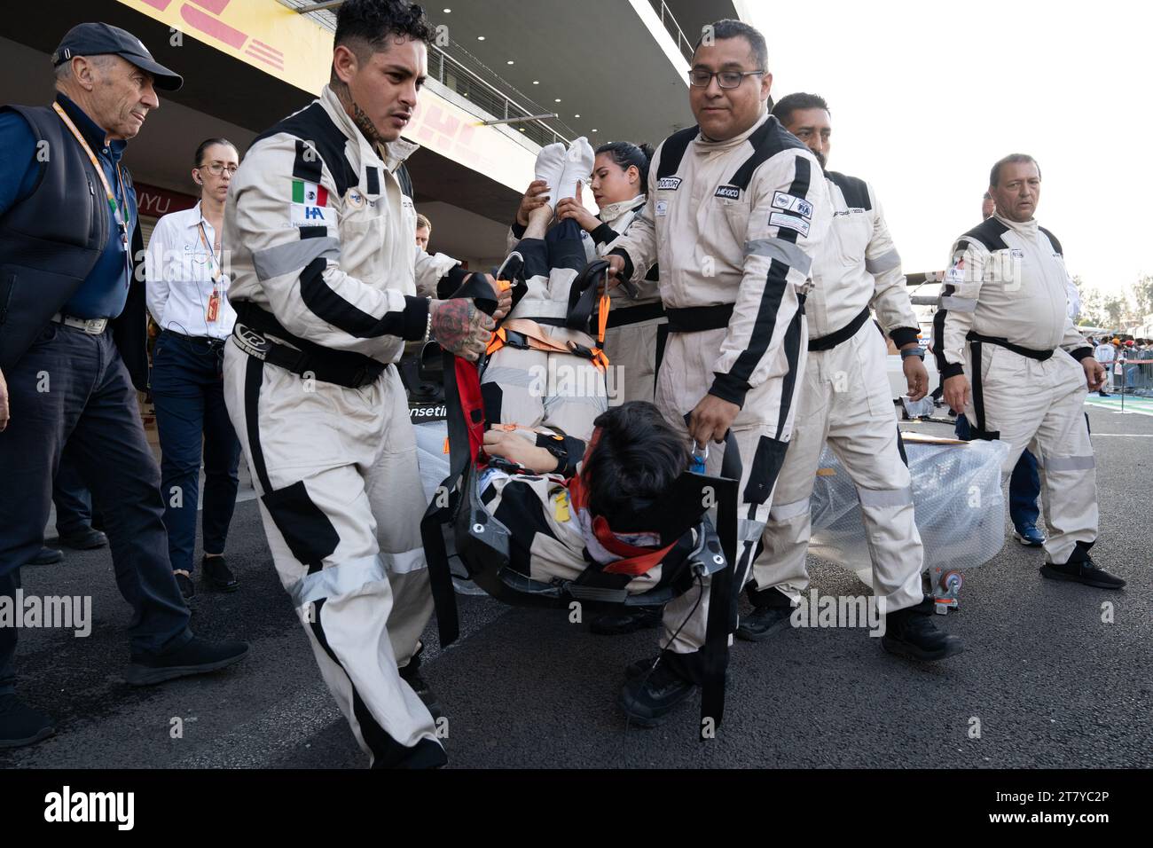 The extrication team practice removing a driver and seat from an F1 car ...