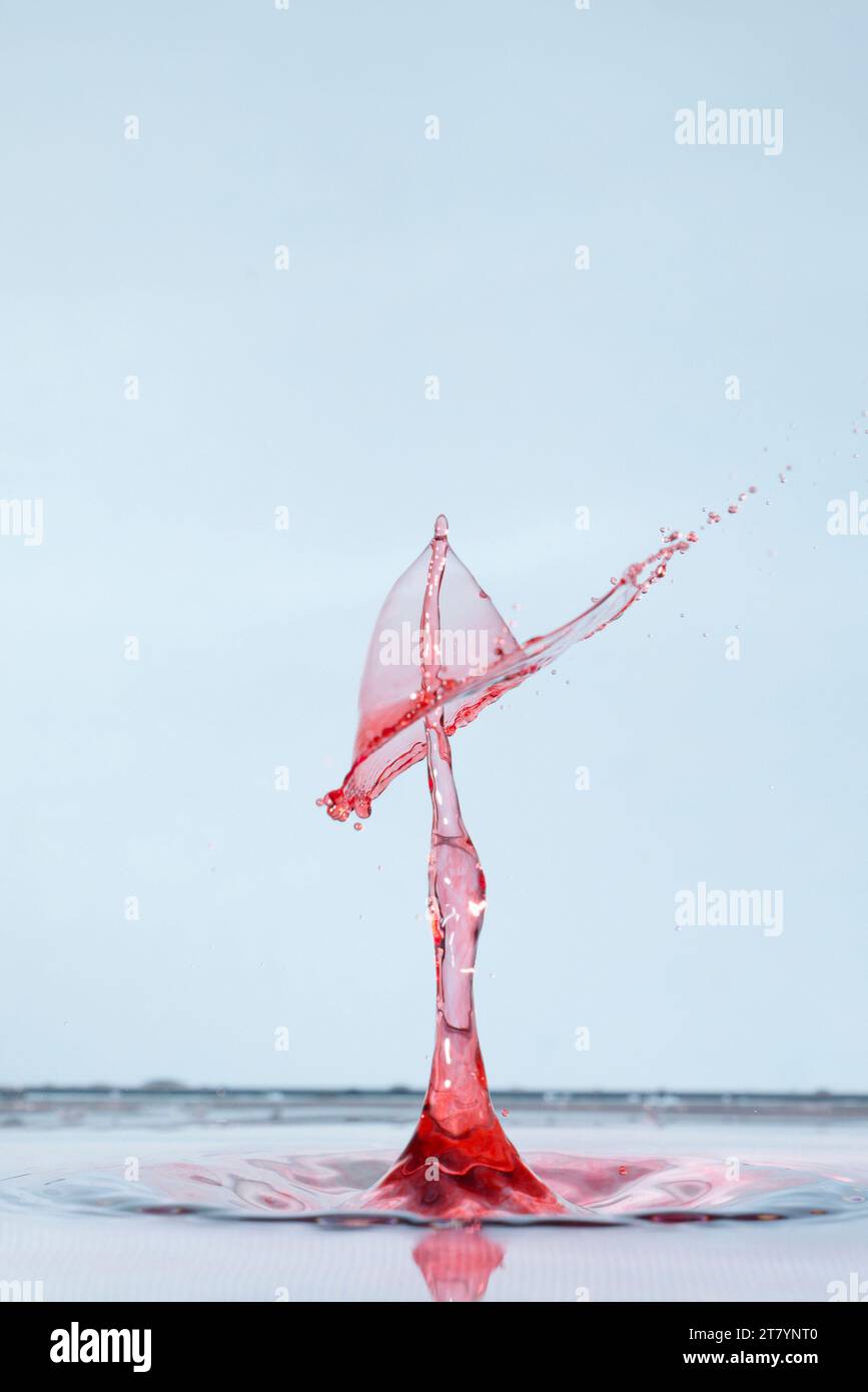 Splash art Photography,, red drops of water colliding to form an ...