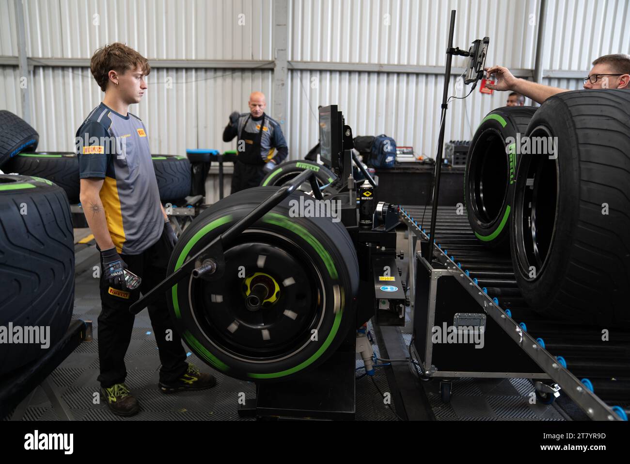 Pirelli’s fitters attach the wheels to the designated tyres for each ...