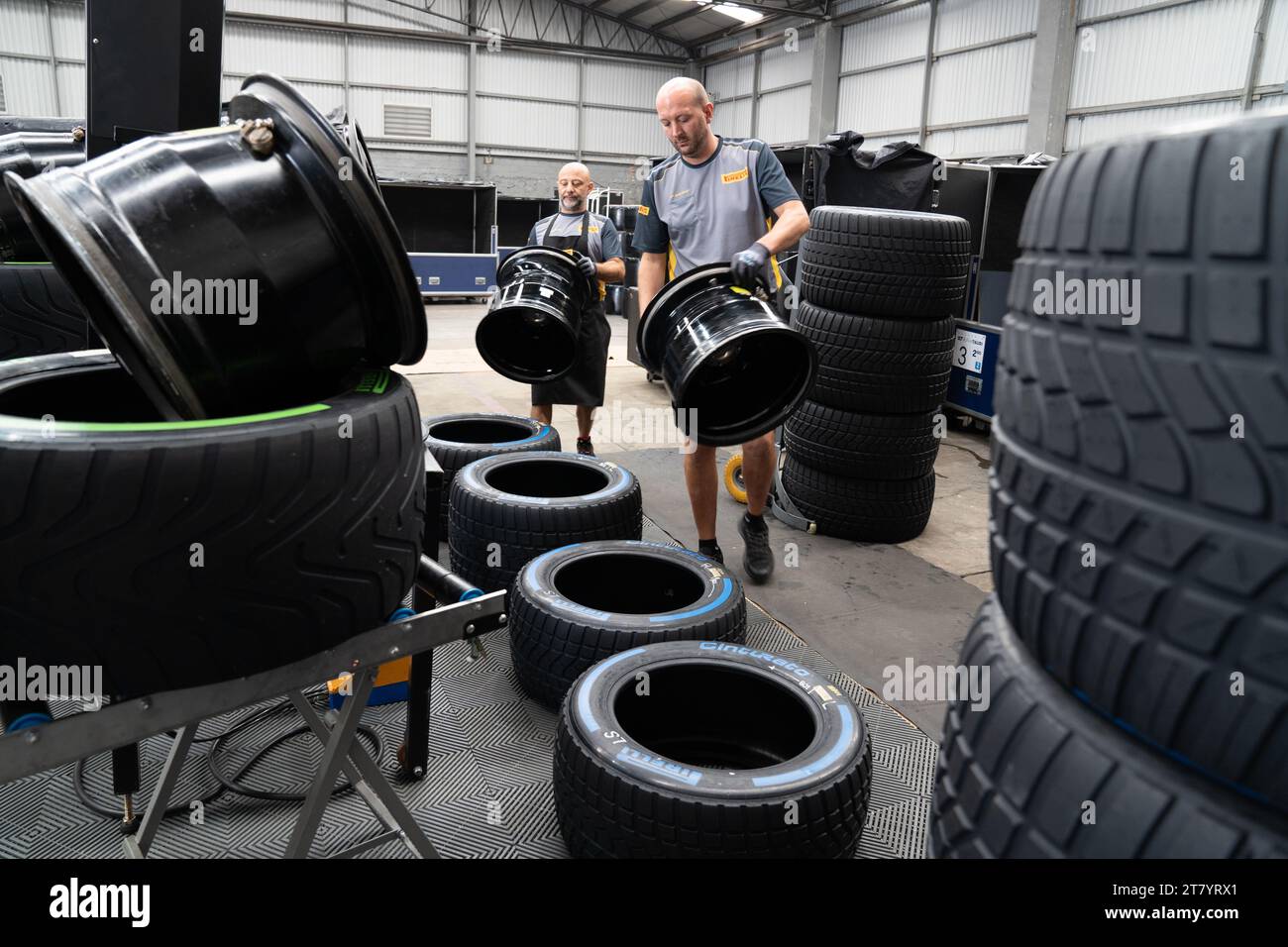 Pirelli’s fitters attach the wheels to the designated tyres for each ...