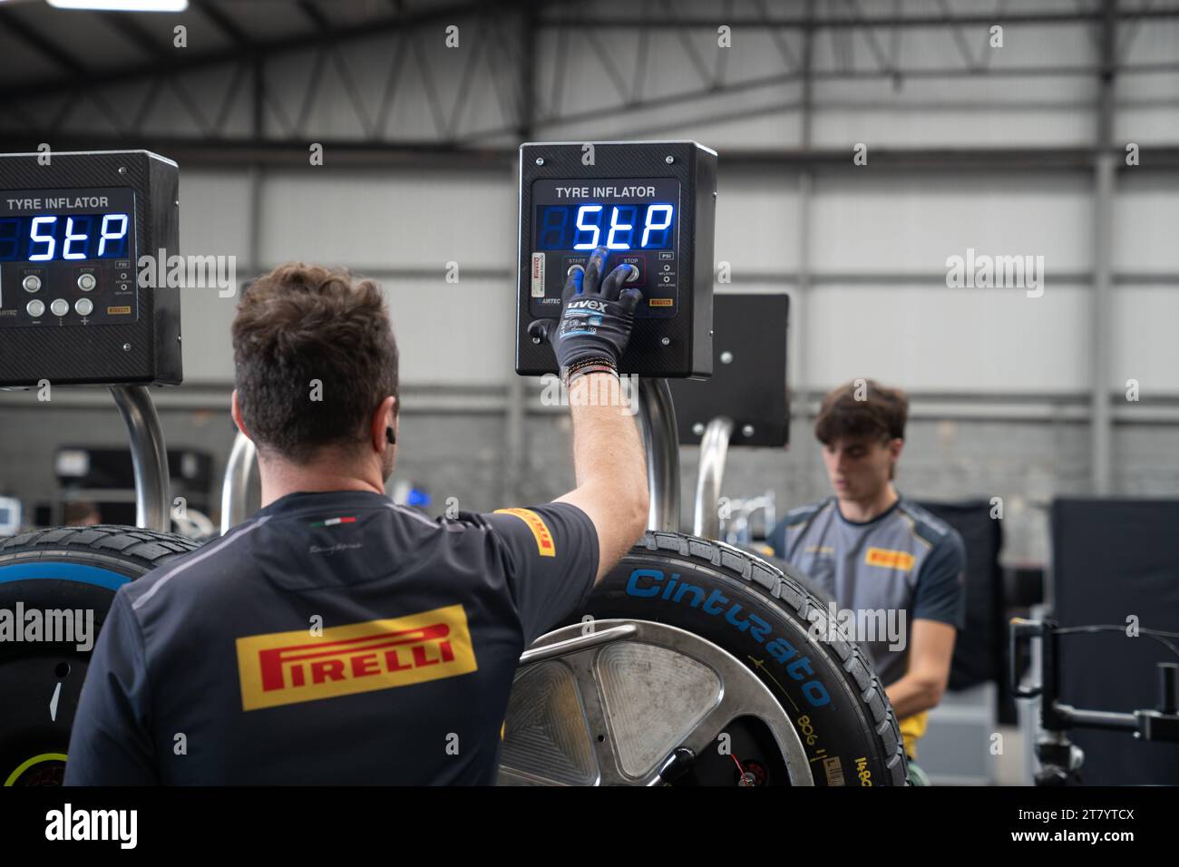 Pirelli’s fitters attach the wheels to the designated tyres for each ...