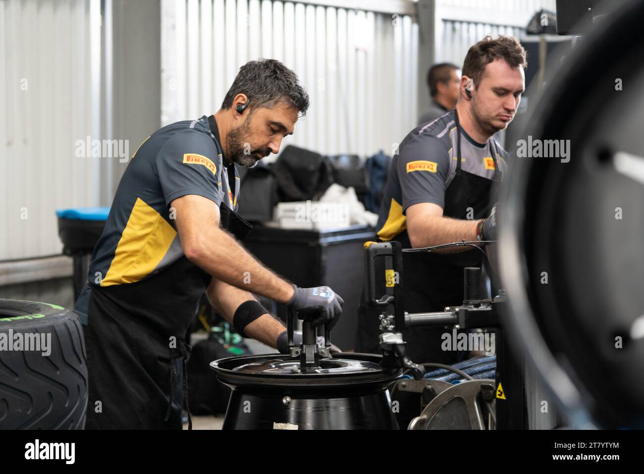 Pirelli’s fitters attach the wheels to the designated tyres for each ...