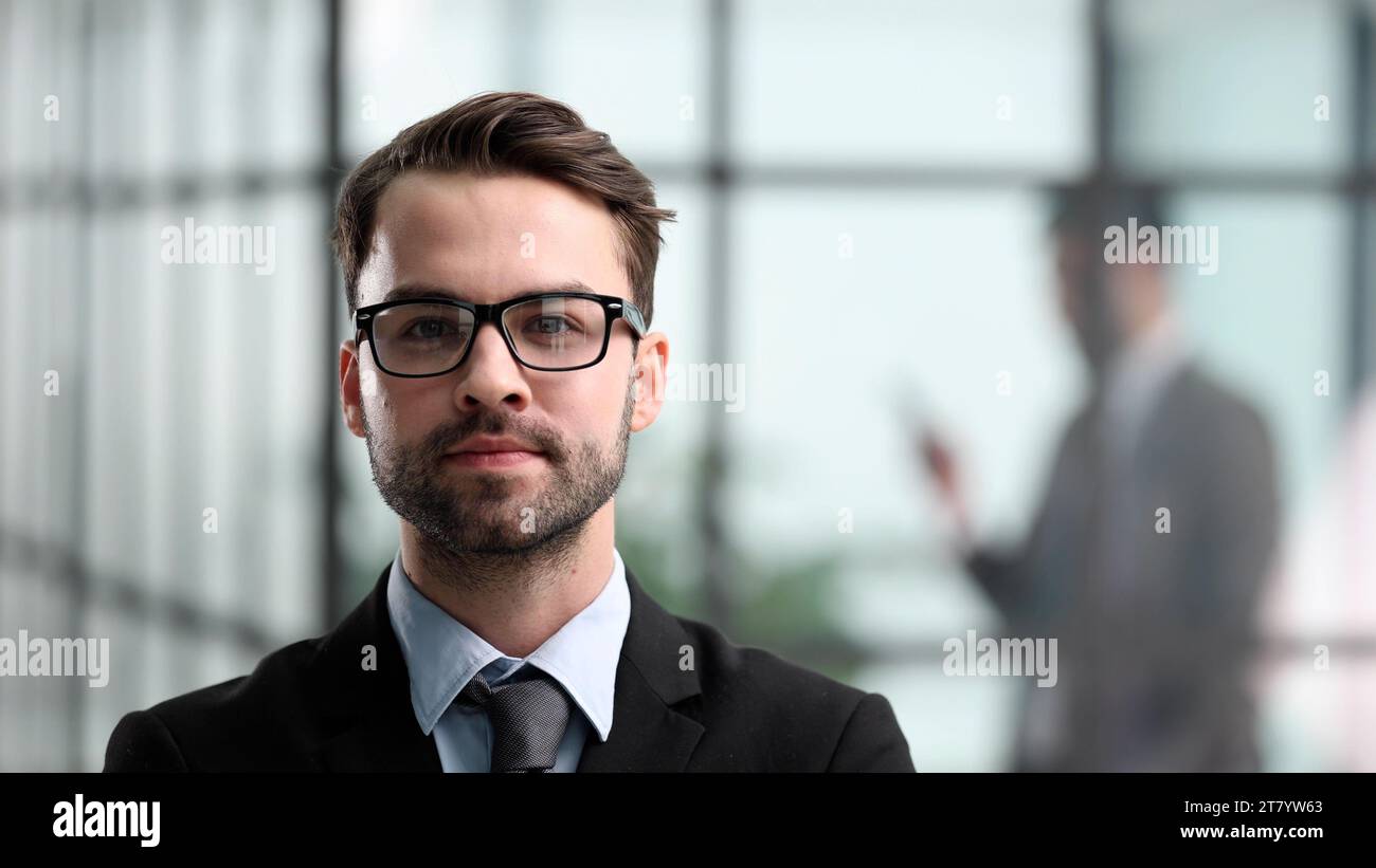 Half-body portrait of stylish young man wearing business suit, close-up ...