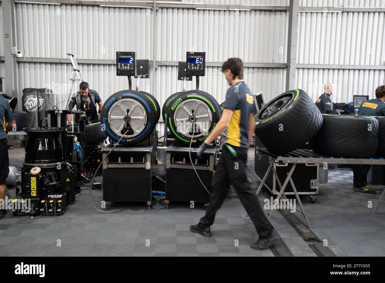 Pirelli’s fitters attach the wheels to the designated tyres for each ...