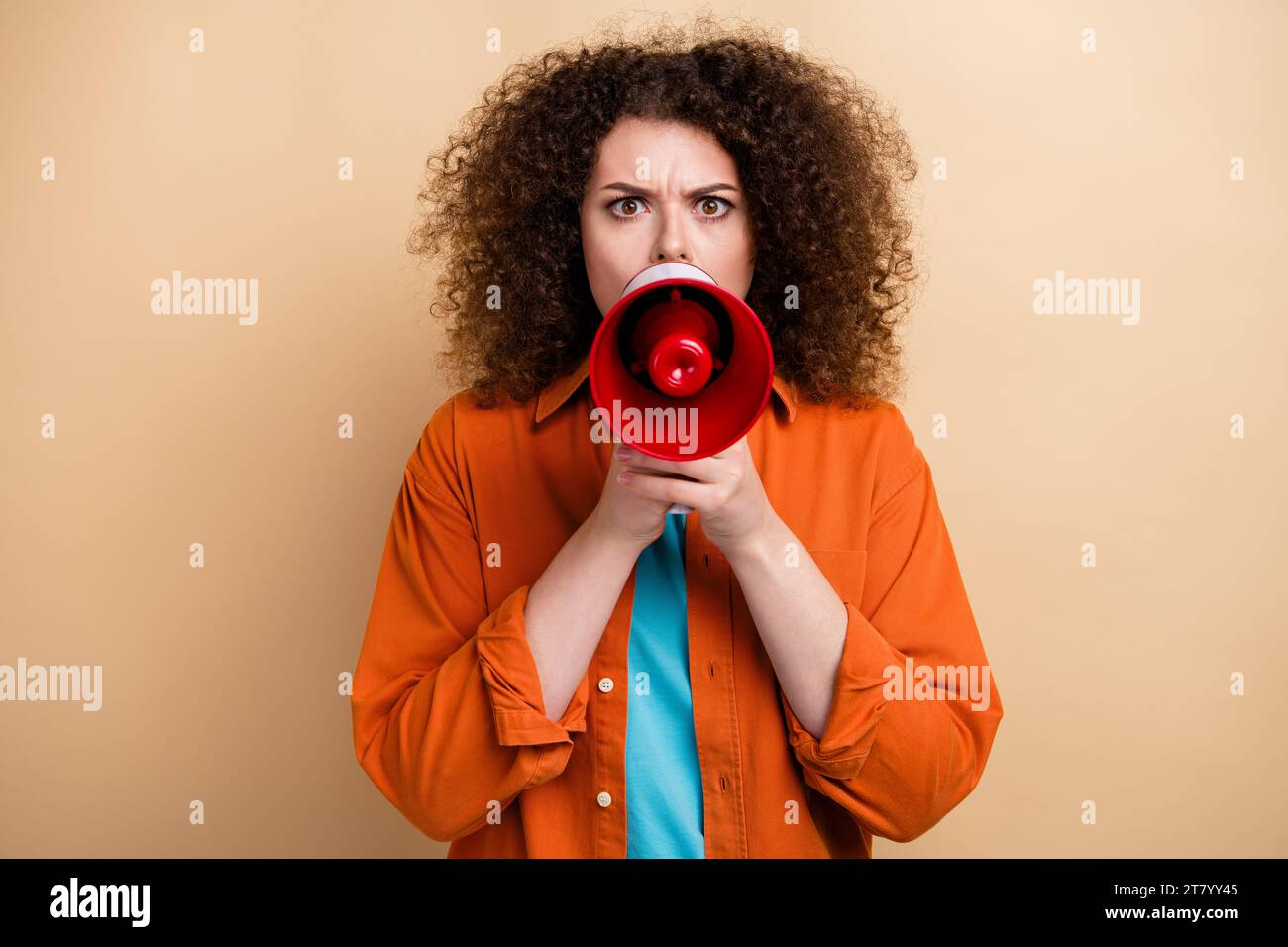 Photo of aggressive furious woman boss shouting holding bullhorn ...