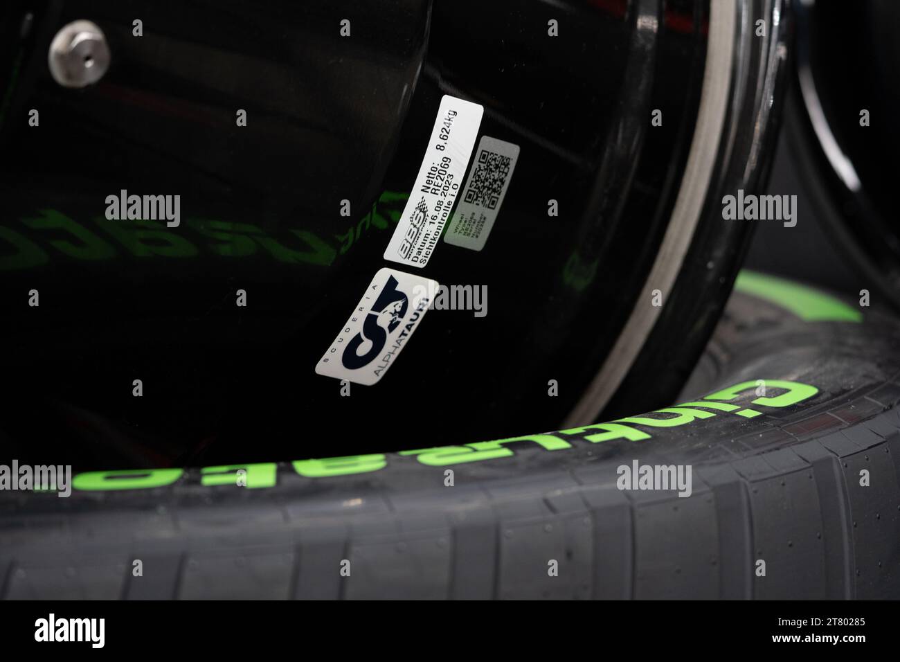 Each team's wheels are fitted with a bar code and sticker to align with ...