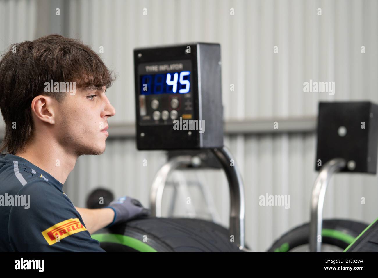 Pirelli’s fitters attach the wheels to the designated tyres for each ...