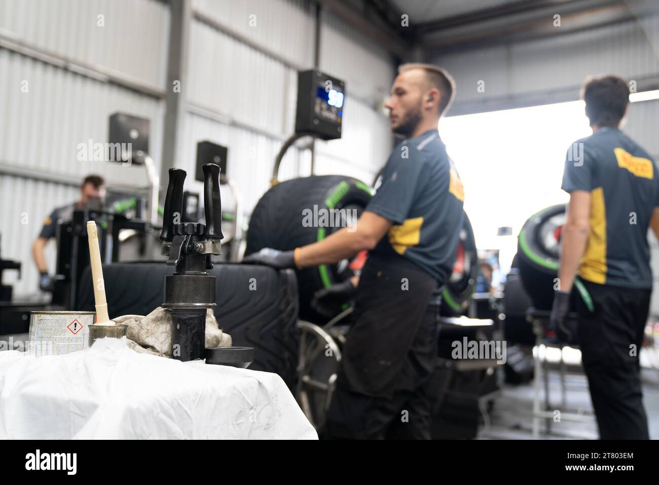 Pirelli’s fitters attach the wheels to the designated tyres for each ...