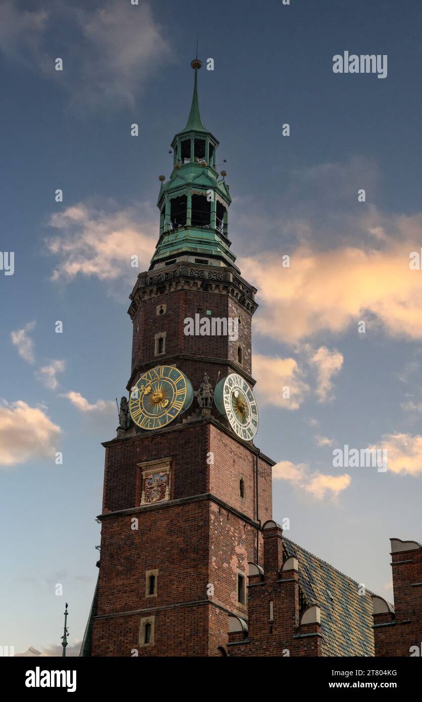 Clock tower building located in the main square in Wroclaw. Old town. Weather is winter and ...