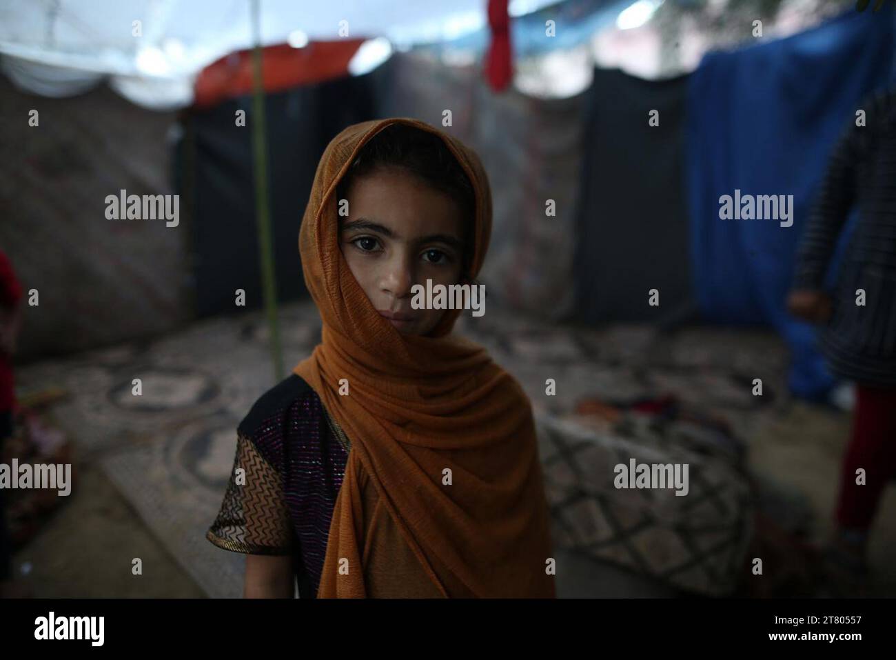 A Palestinian displaced child woke up to the rainwater that drowned the ...