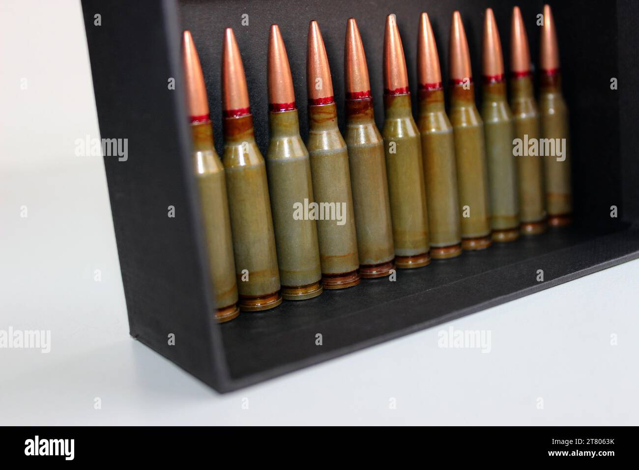 Line Of Rifle Bullets In Cardboard Box Angle View Stock Photo Stock ...