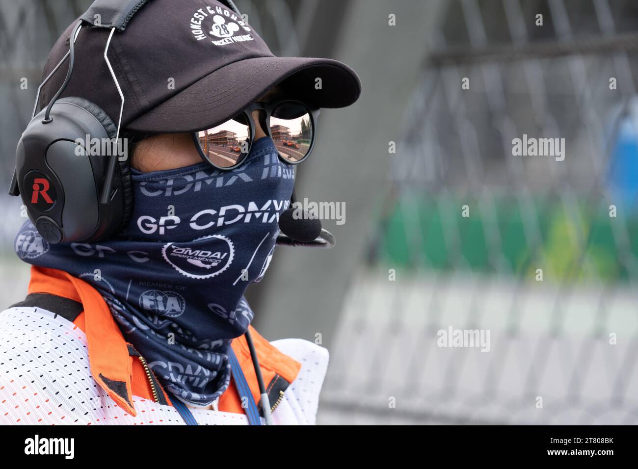Around the track, members of the flag control team, race control ...