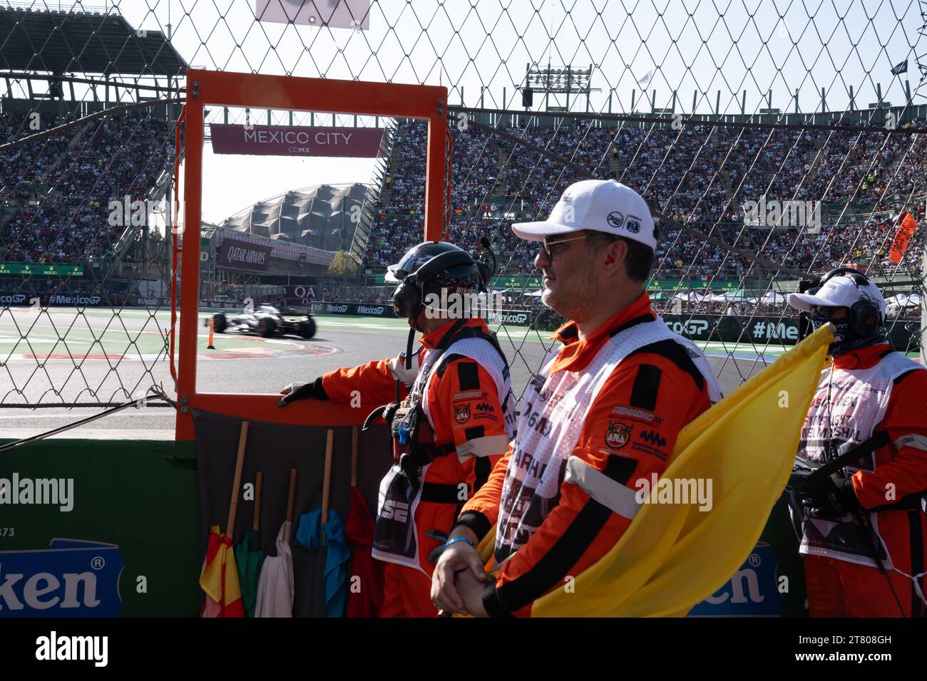 The flag marshals tell the drivers when to slow down, let other cars ...