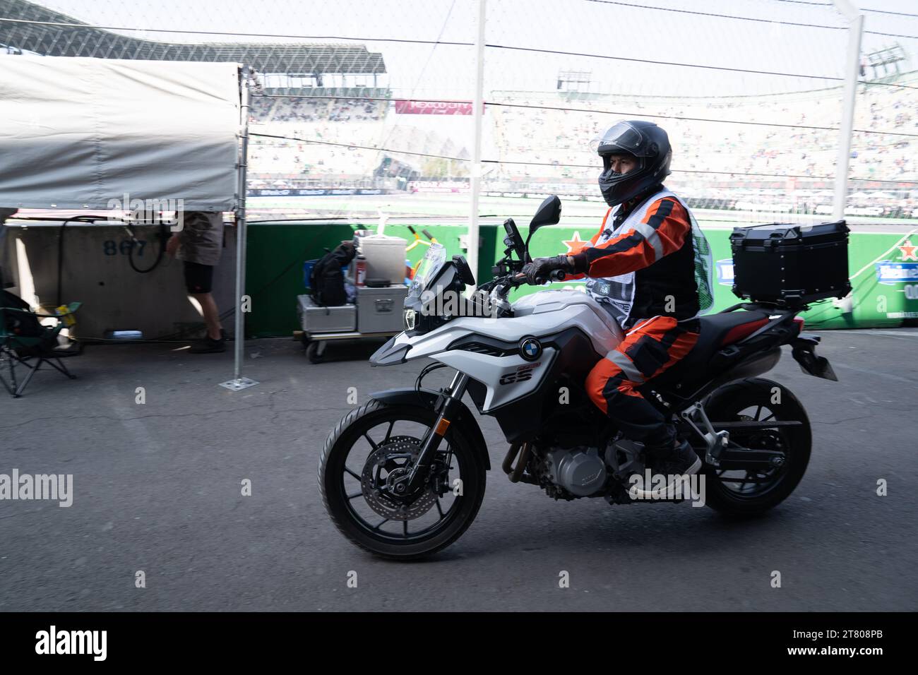 Around the track, teams of motorbike boundary riders patrol the border ...