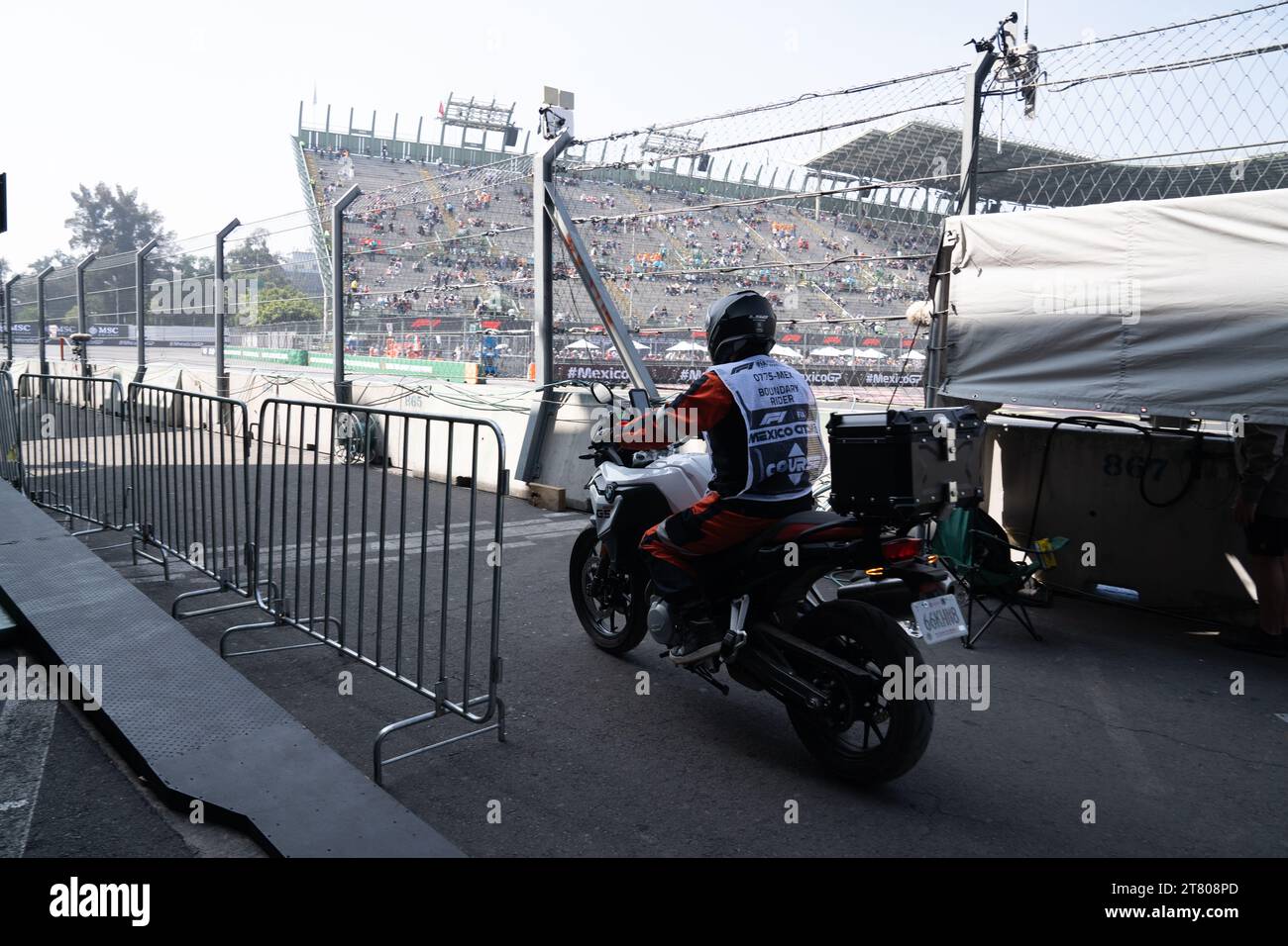 Around the track, teams of motorbike boundary riders patrol the border ...