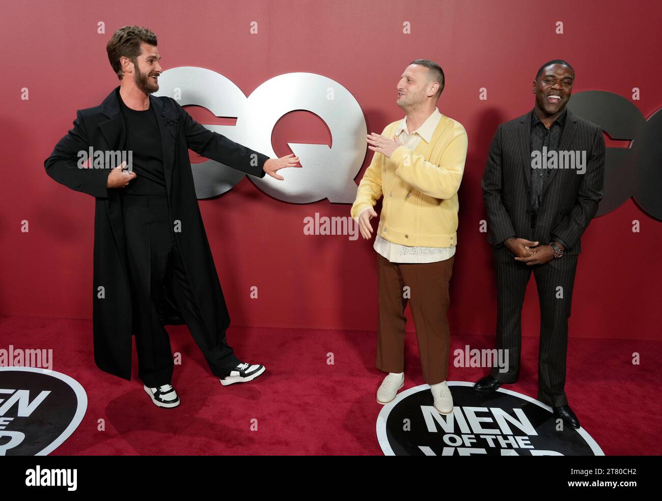 Actor Andrew Garfield, left, mingles with actors Tim Robinson, center ...