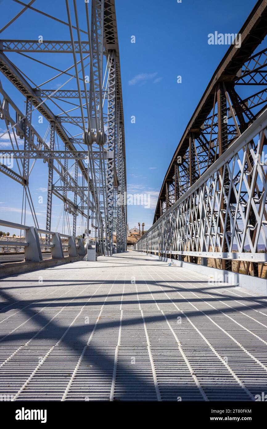 metal bridge above city river Stock Photo - Alamy