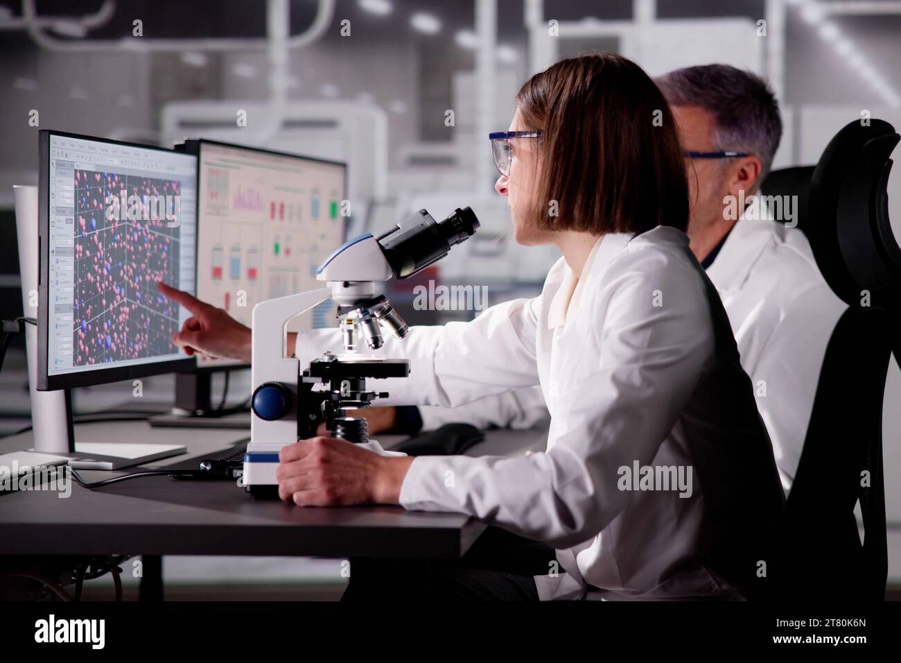 An African American Doctor Conducts Hospital Research Using a Computer ...