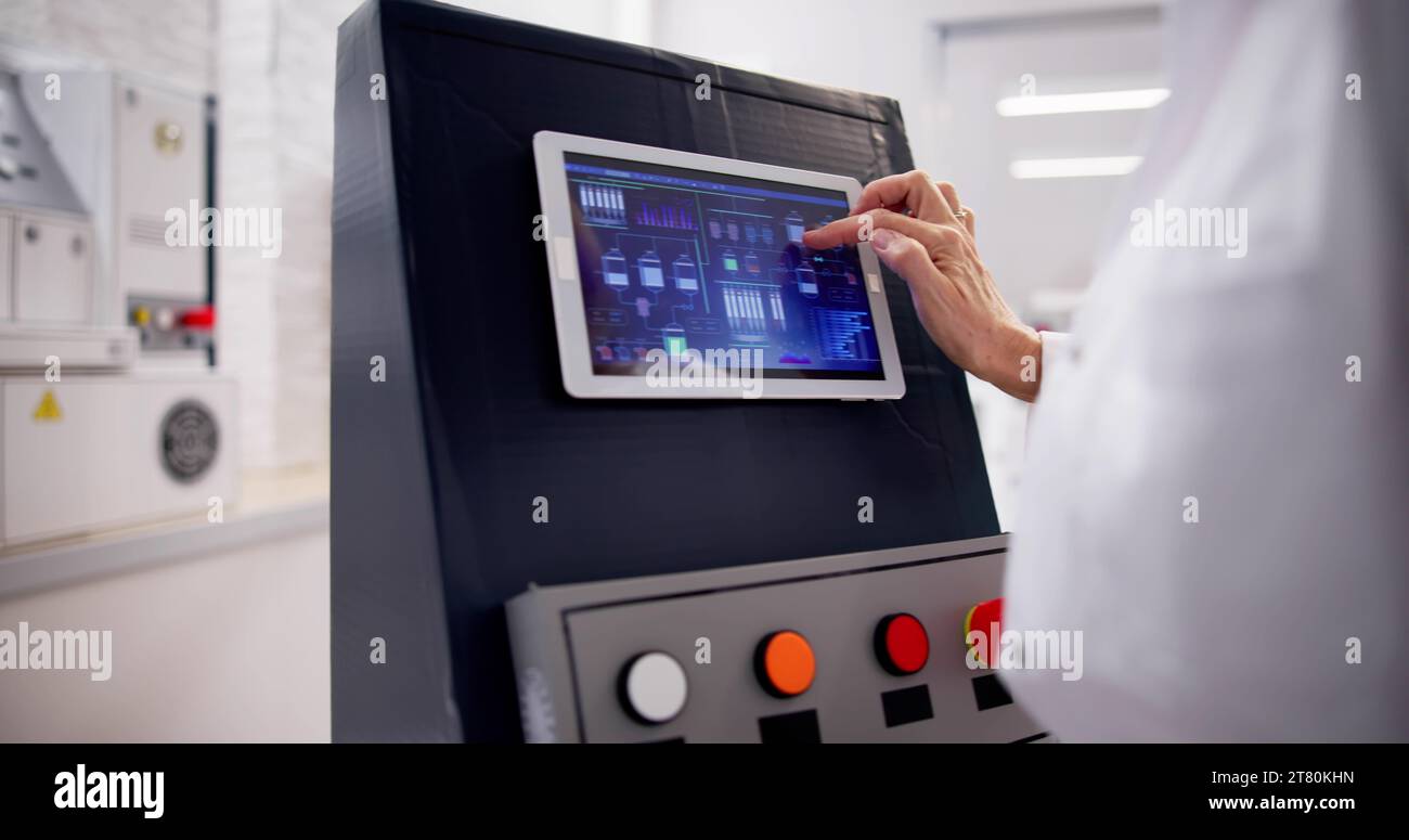 Skilled Operator Repairing Machine in Factory, Boosting Production ...