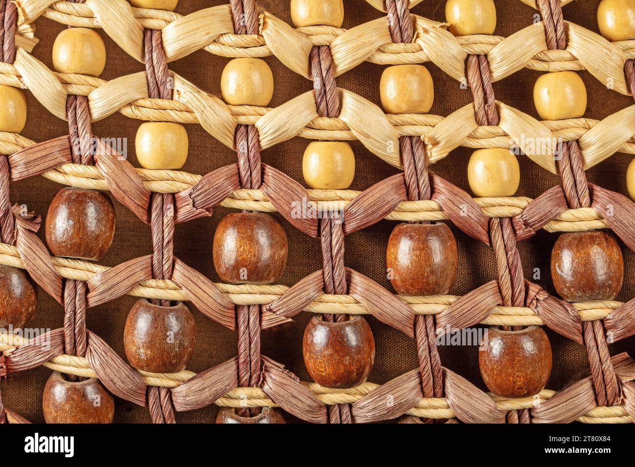 Colorful background made of reed mat and wooden balls Stock Photo - Alamy