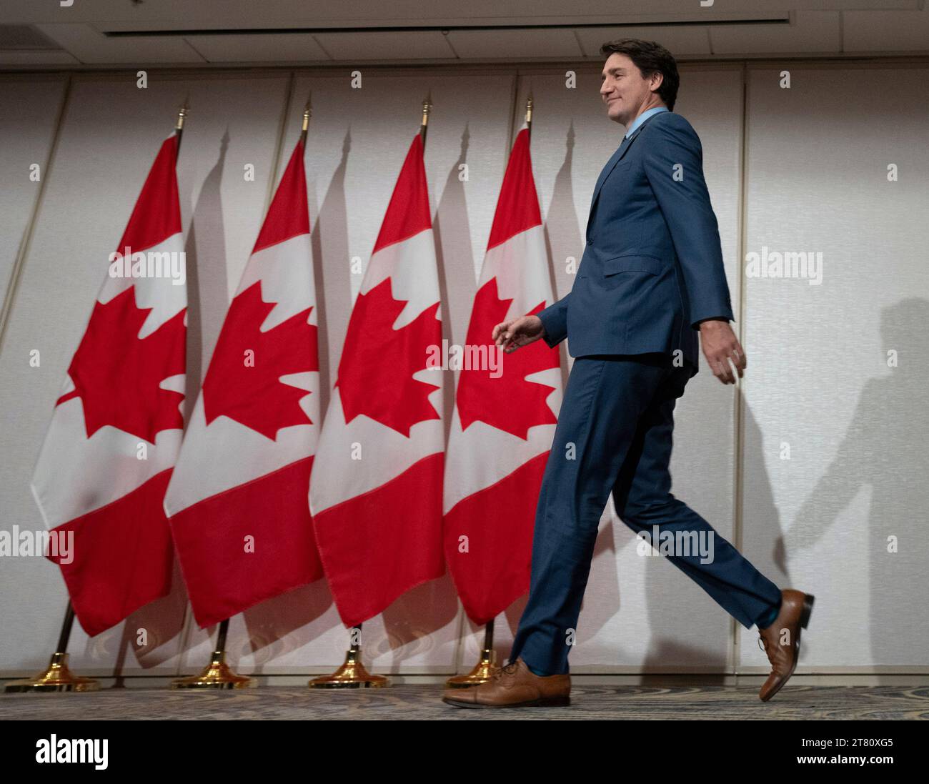 Prime Minister Justin Trudeau makes his way to the podium for a media ...