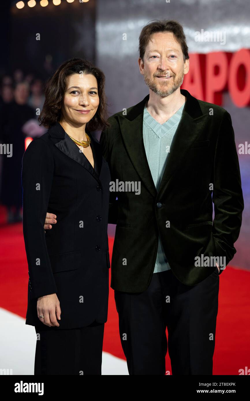 Agni Scott, left, and Scott Handy pose for photographers upon arrival ...