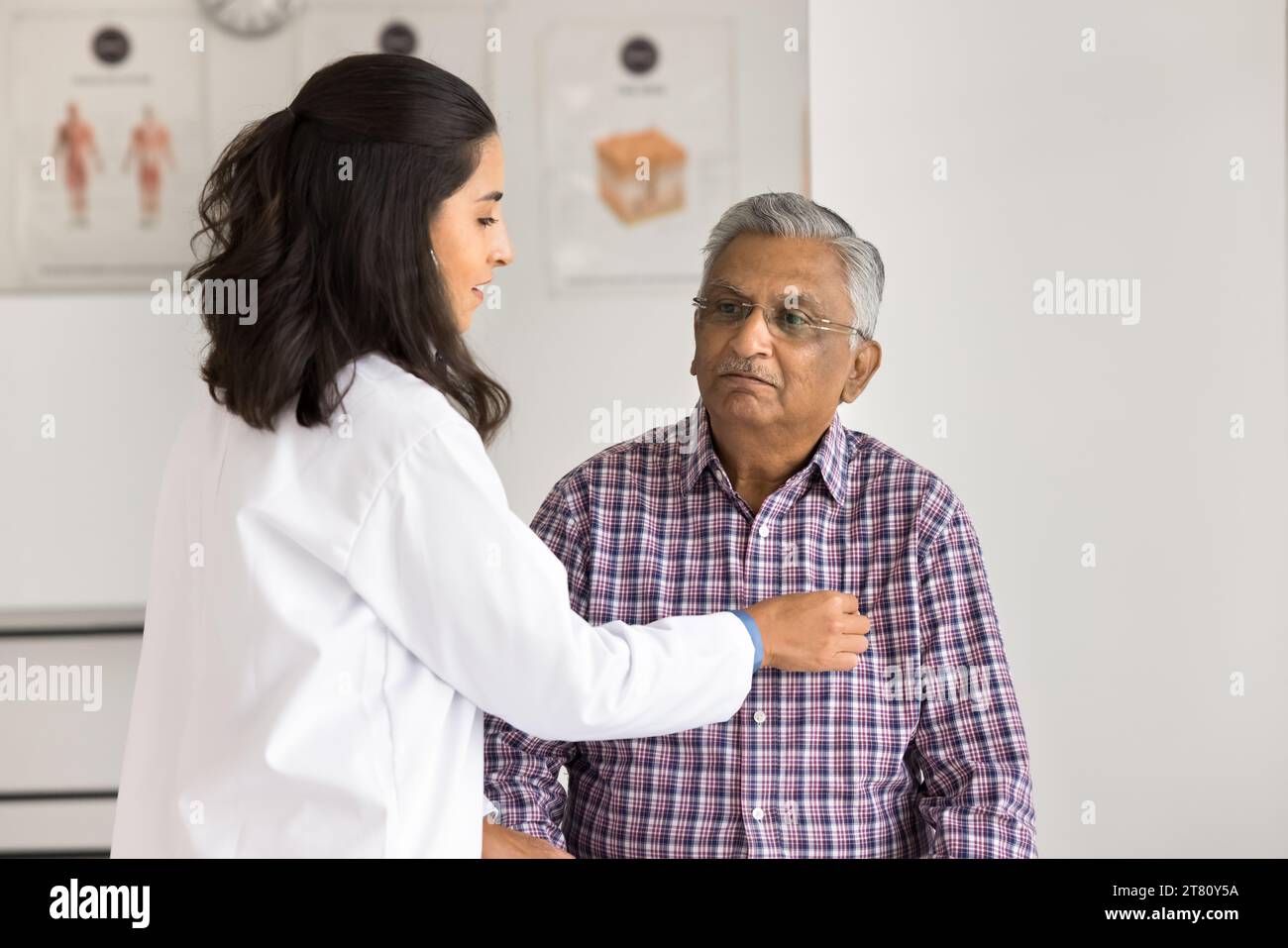 Senior Indian patient visiting medical practitioner woman for heart ...