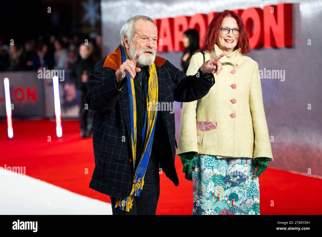 Terry Gilliam, left, and Maggie Weston pose for photographers upon ...