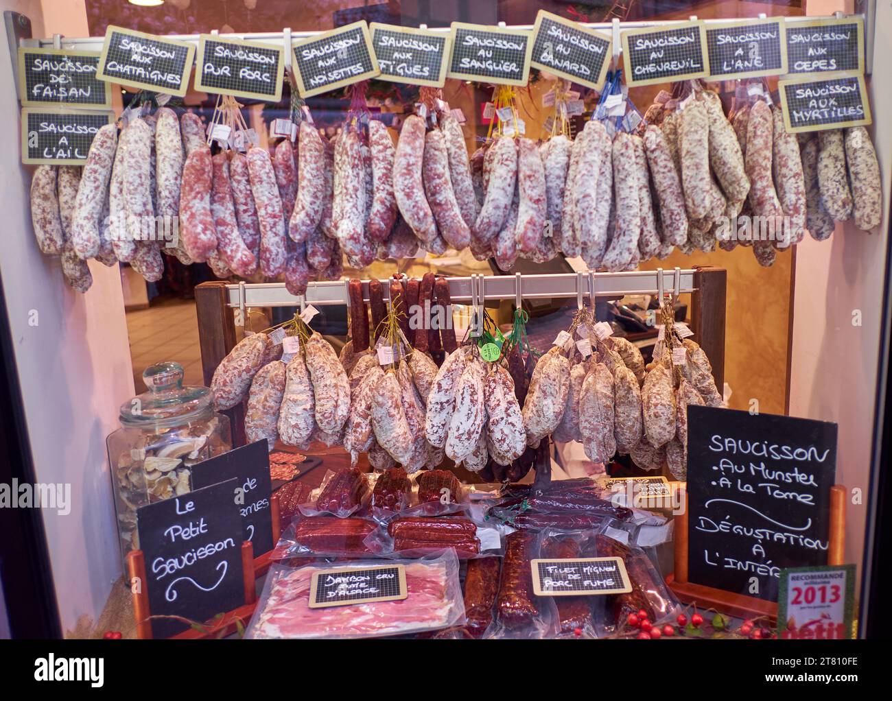 Different types of Alsatian dry sausages in a shop vitrine Stock Photo ...