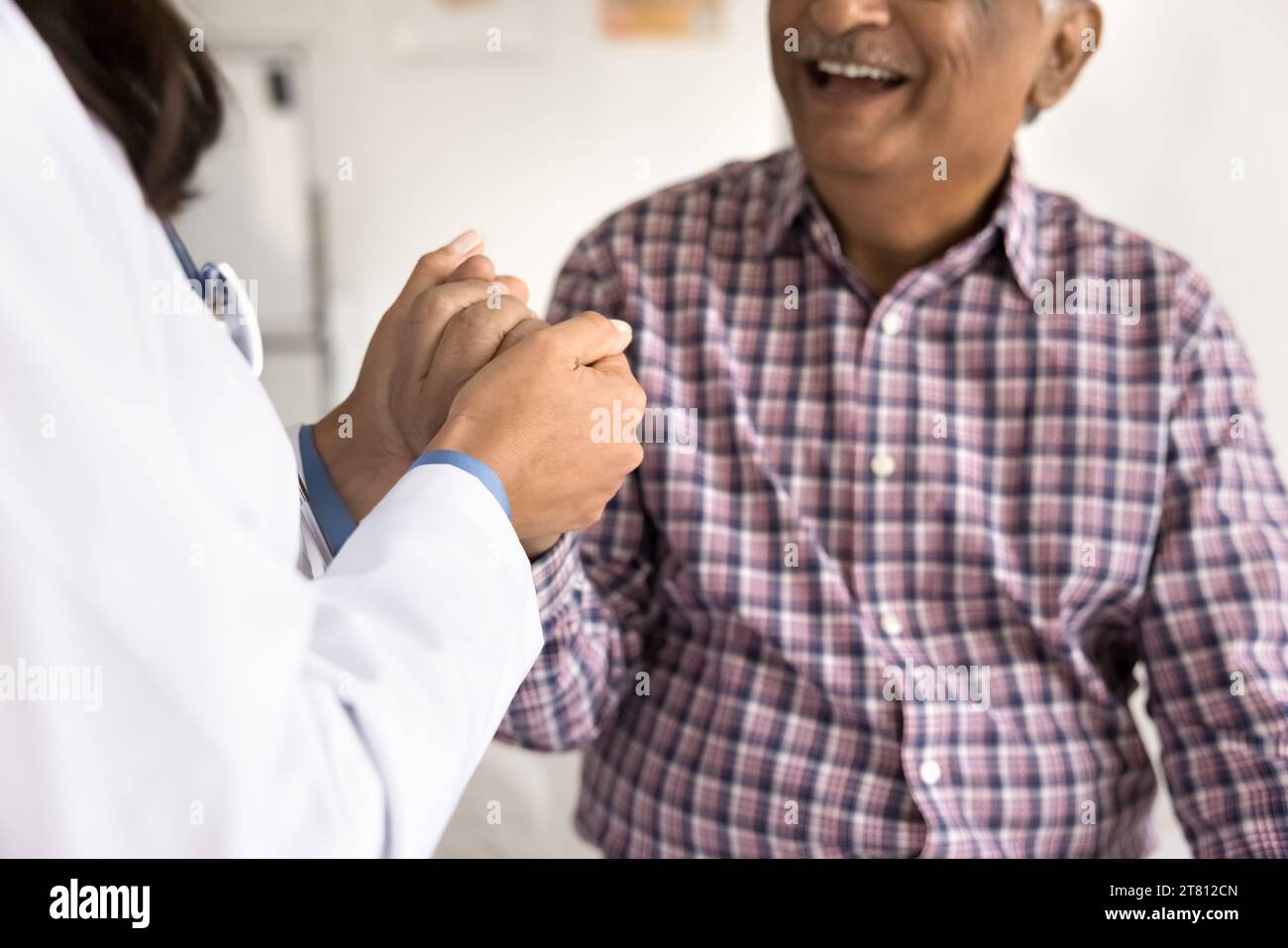 Positive cheerful elder man visiting doctor, consulting therapist Stock ...