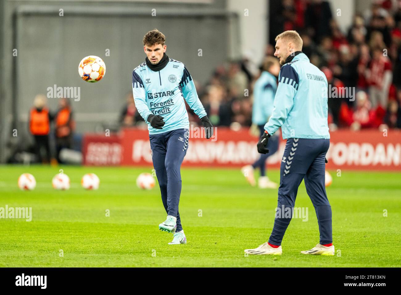 Copenhagen, Denmark. 17th Nov, 2023. Matt O'Riley of Denmark is warming ...