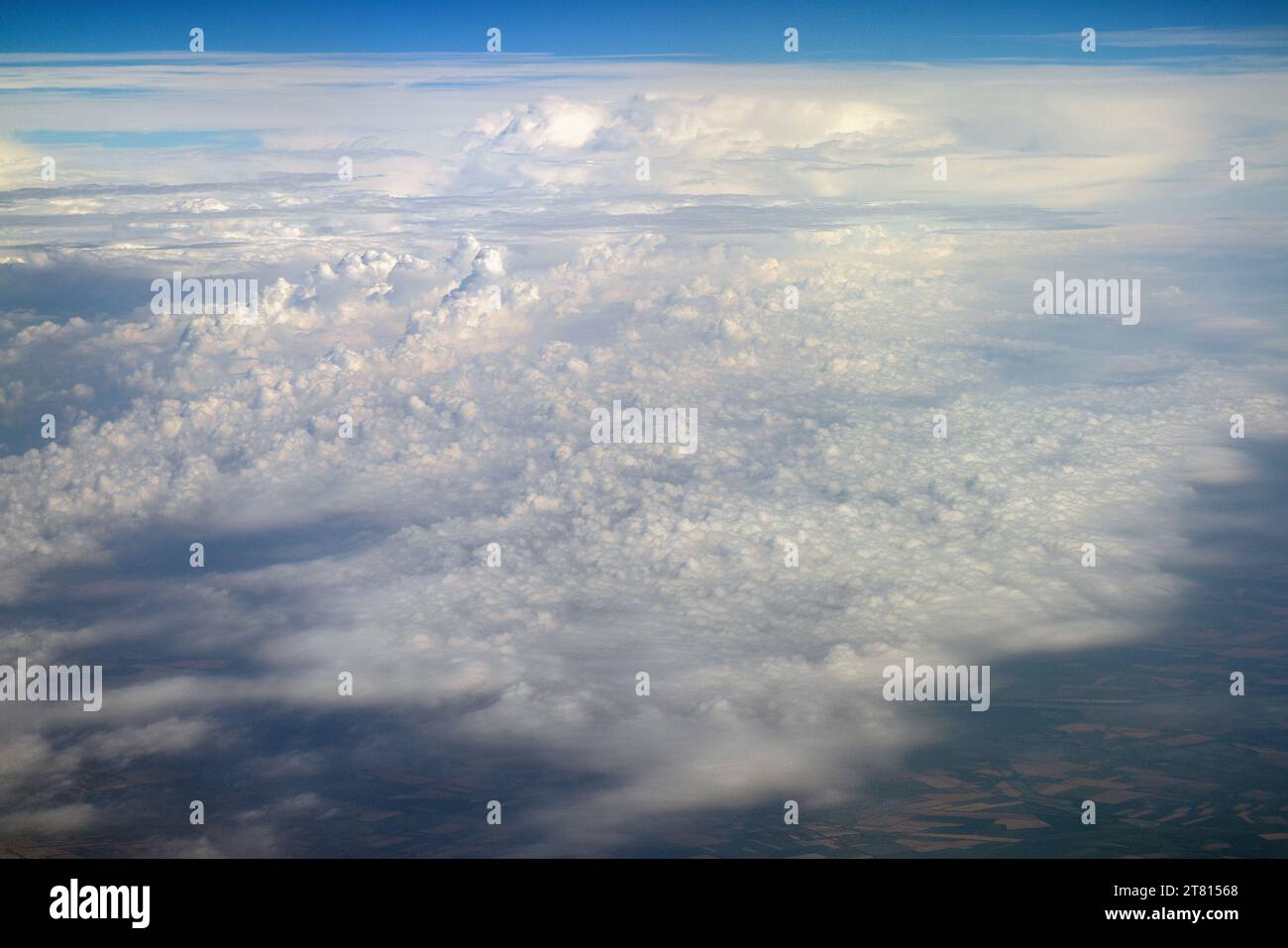 view above clouds from airplane window, above the clouds Stock Photo ...