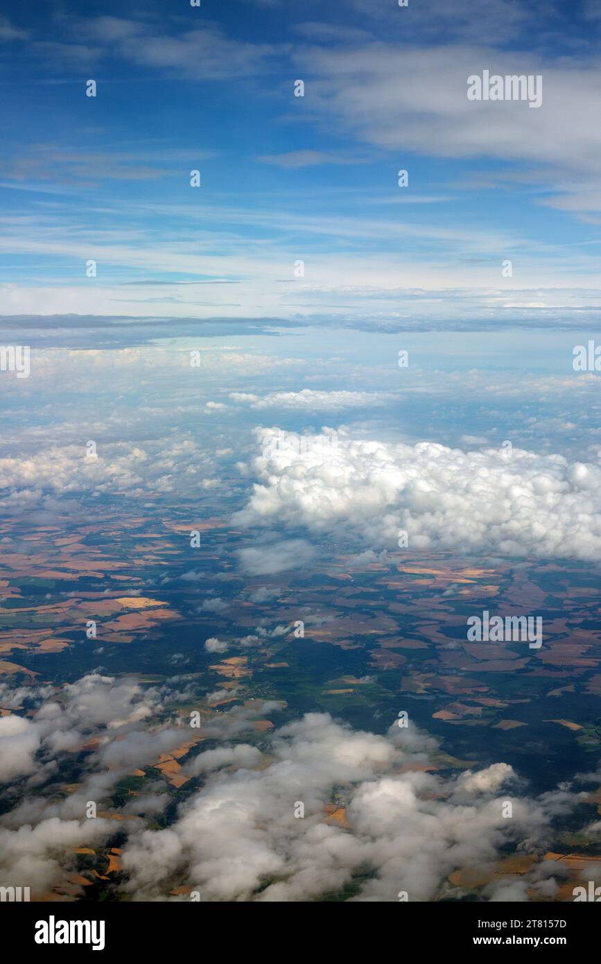 view above clouds from airplane window, above the clouds Stock Photo ...