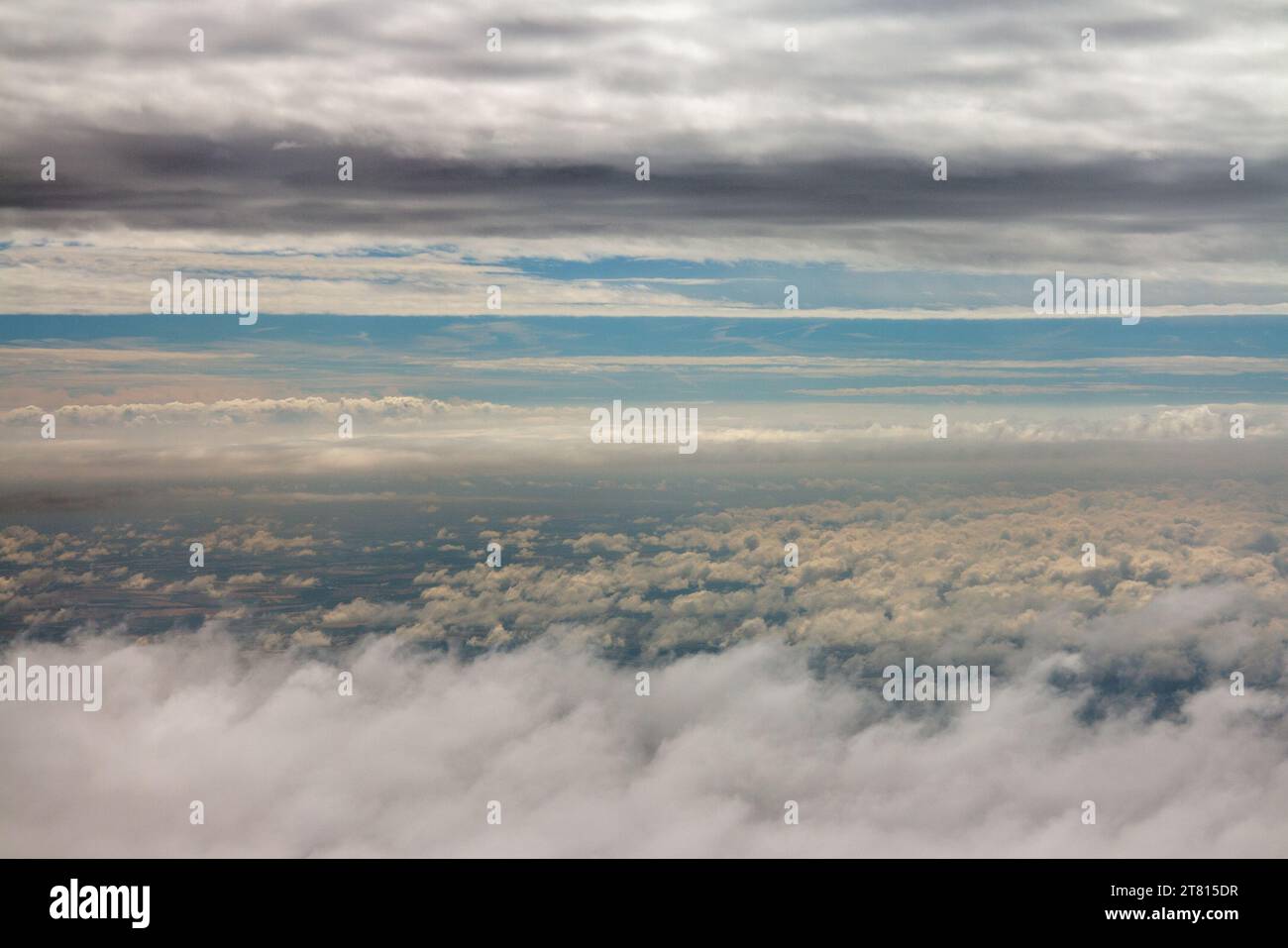 view above clouds from airplane window, above the clouds Stock Photo ...