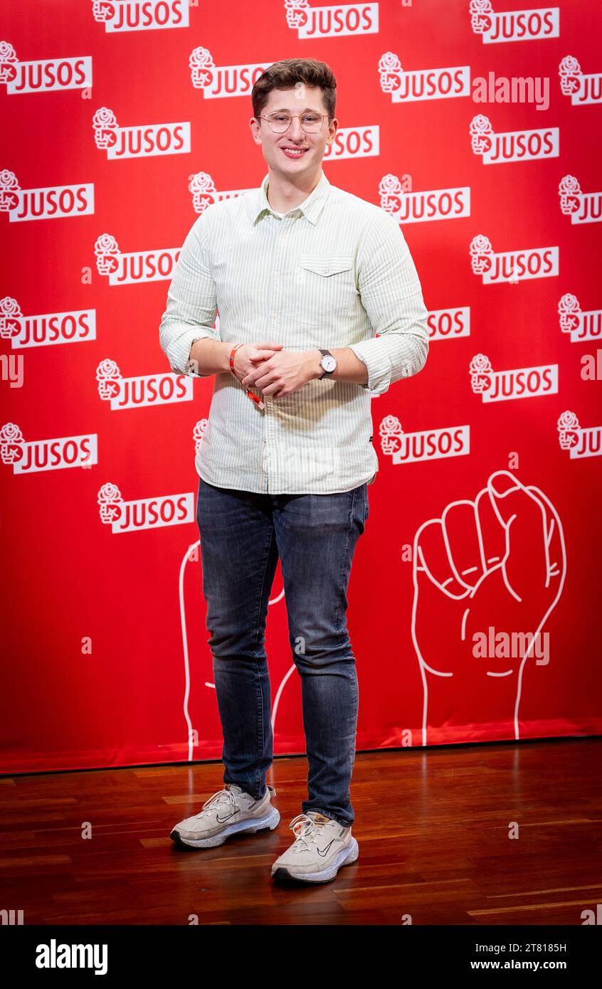 Brunswick, Germany. 17th Nov, 2023. Philipp Türmer, new Jusos national chairman, stands in front ...