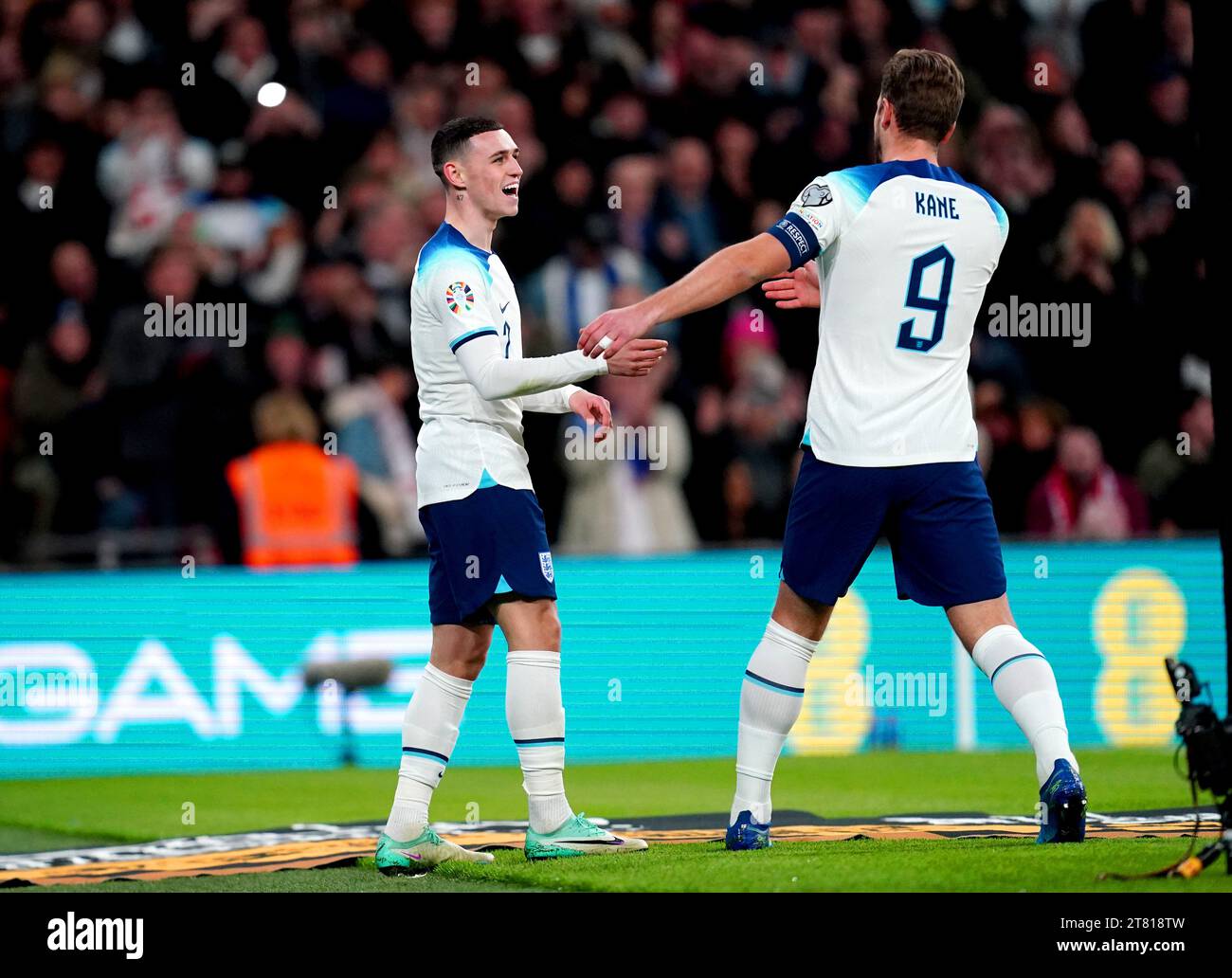 England's Phil Foden (left) and Harry Kane celebrate after Malta's ...