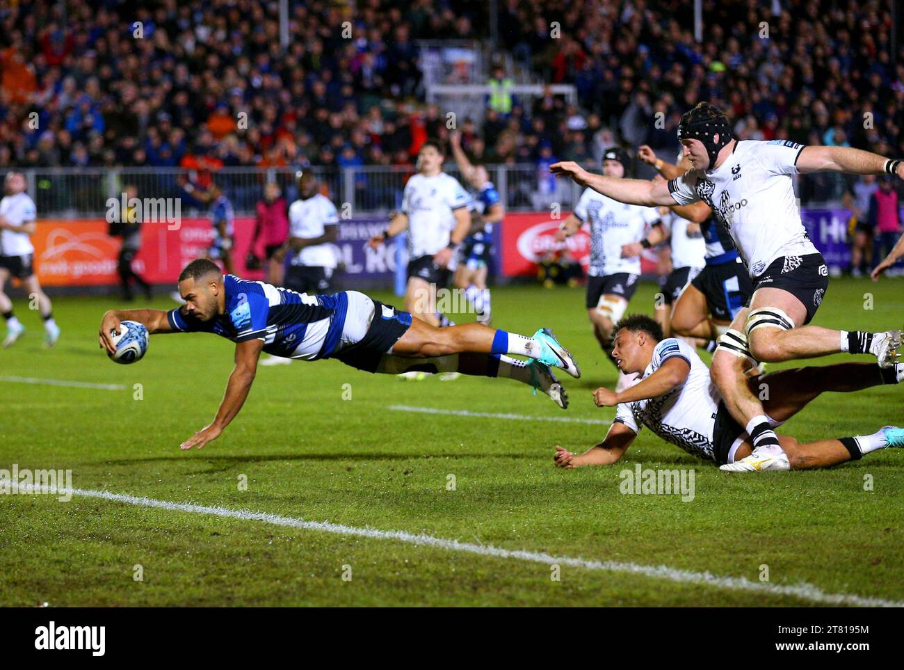 Bath Rugby's Ollie Lawrence scores his side's first try of the game ...