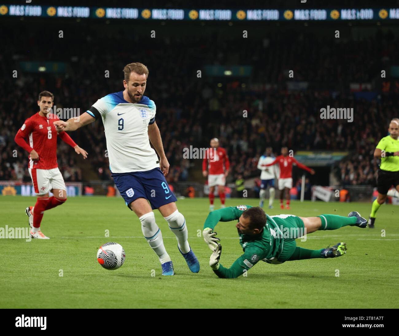 London, UK. 17th Nov, 2023. Harry Kane (E) brought down by Henry ...