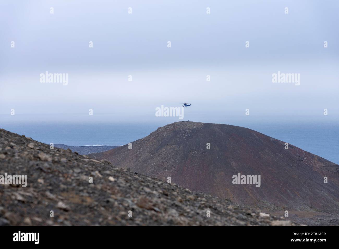 People being loaded into a helicopter near Fagradalsfjall volcano in ...