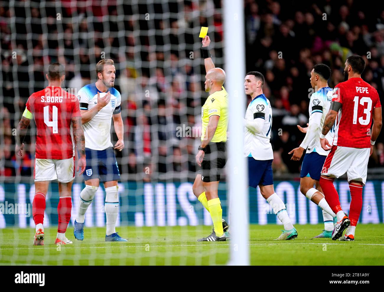 England's Harry Kane is shown a yellow card for simulation during the ...